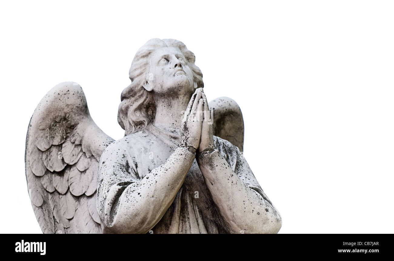Beautiful statue of the angel praying. Isolated on white background ...