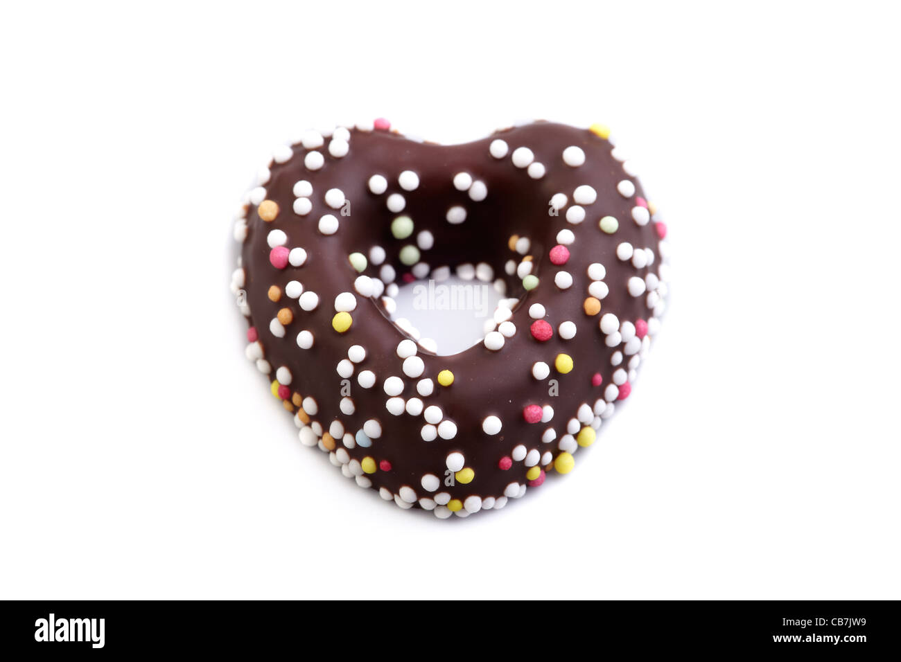 One Sugar curl isolated on white background Stock Photo - Alamy