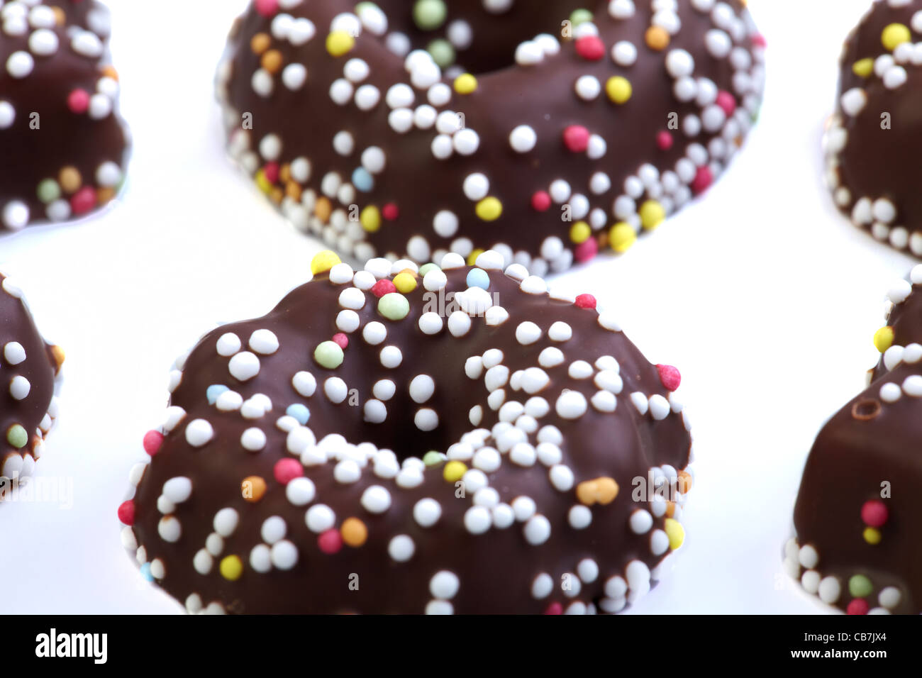 Many Sugar curls isolated on white background Stock Photo - Alamy