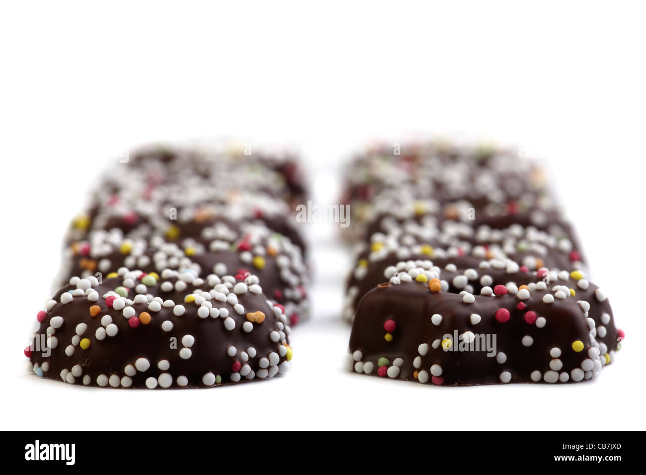 Many Sugar curls isolated on white background Stock Photo - Alamy