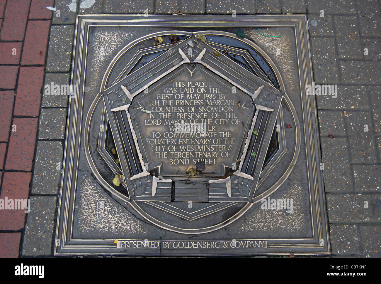 pavement plaque commemorating the quatercentenary of the city of ...
