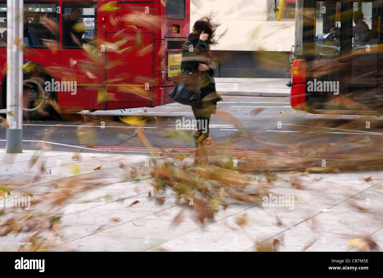 Strong wind blowing woman hi-res stock photography and images - Alamy