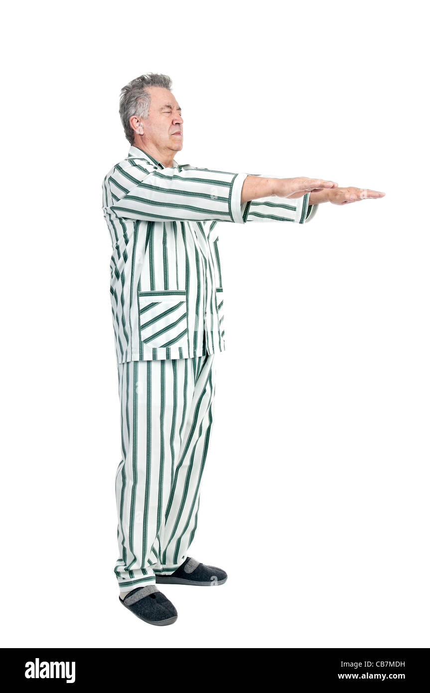 Senior man in pajamas sleepwalking Stock Photo - Alamy