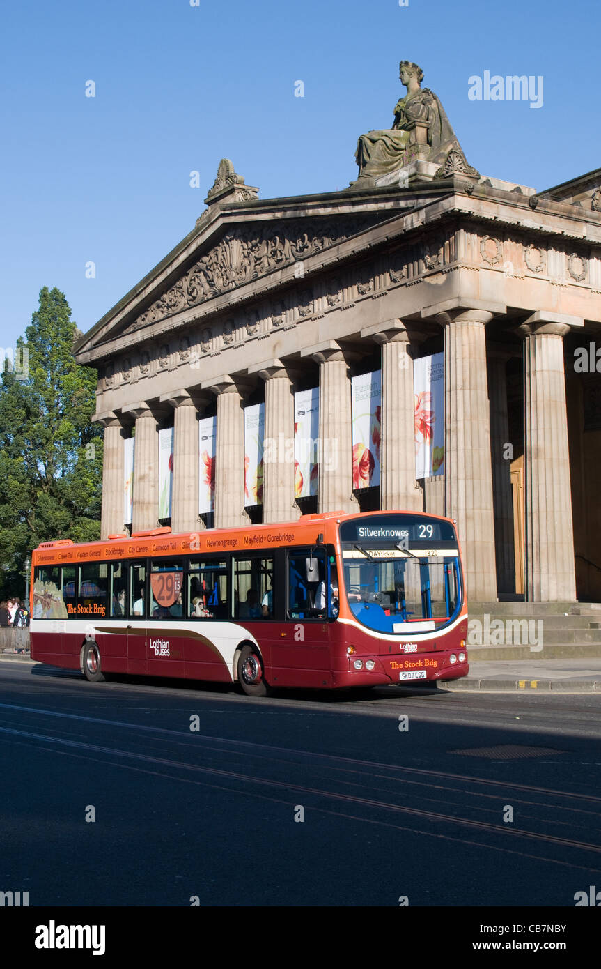 A single deck bus operated by Lothian Buses passes the Royal Scottish ...