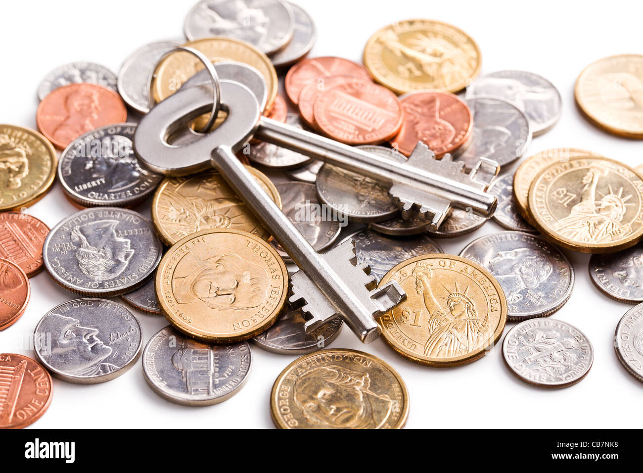 the safe key with coins Stock Photo - Alamy