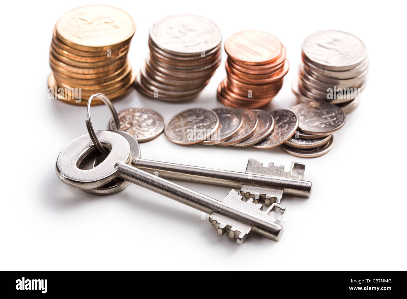 the safe key with coins Stock Photo - Alamy