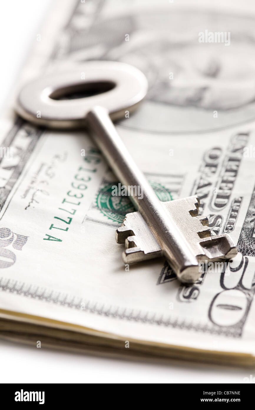 the safe key with money Stock Photo - Alamy