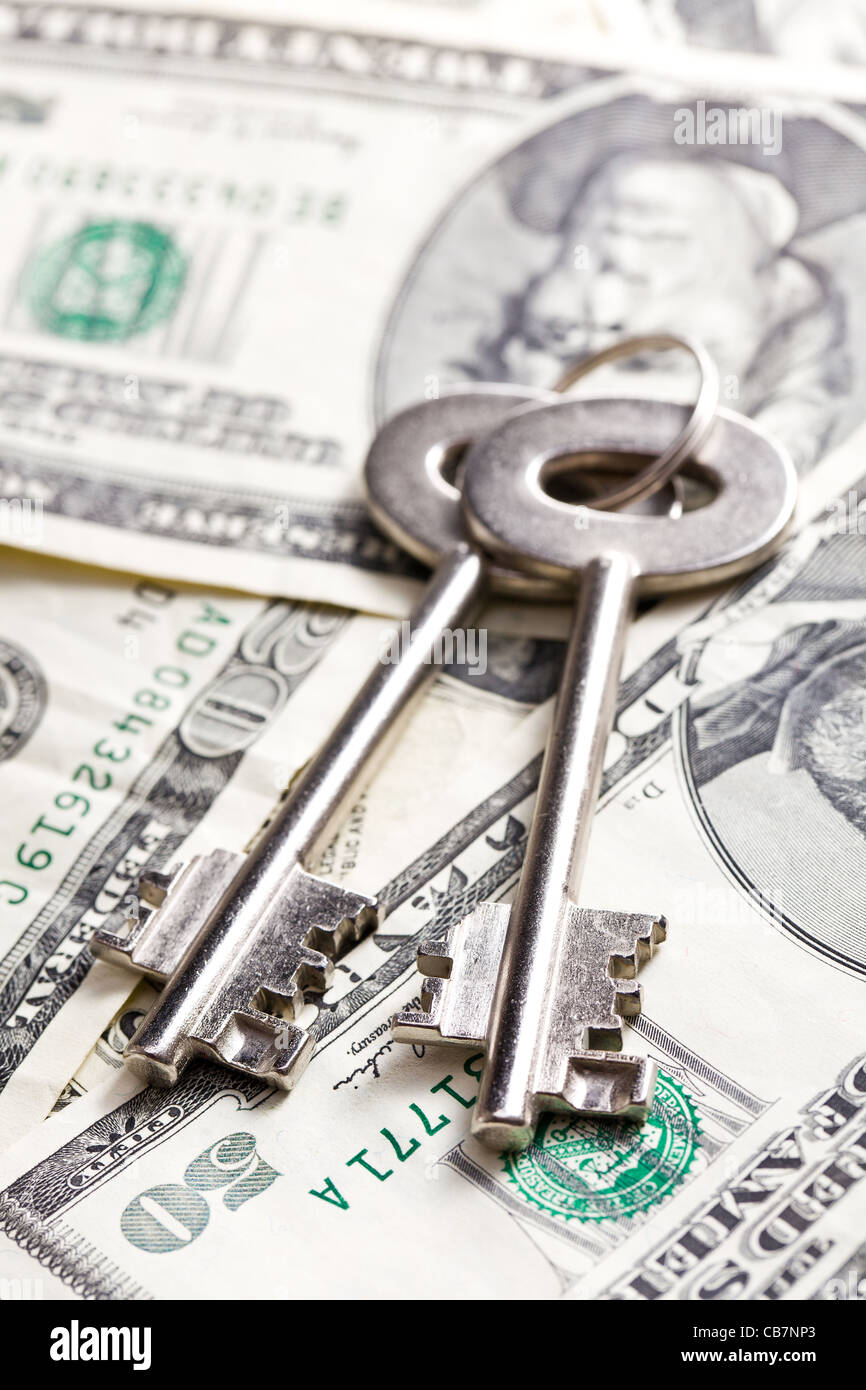 the safe key with money Stock Photo - Alamy