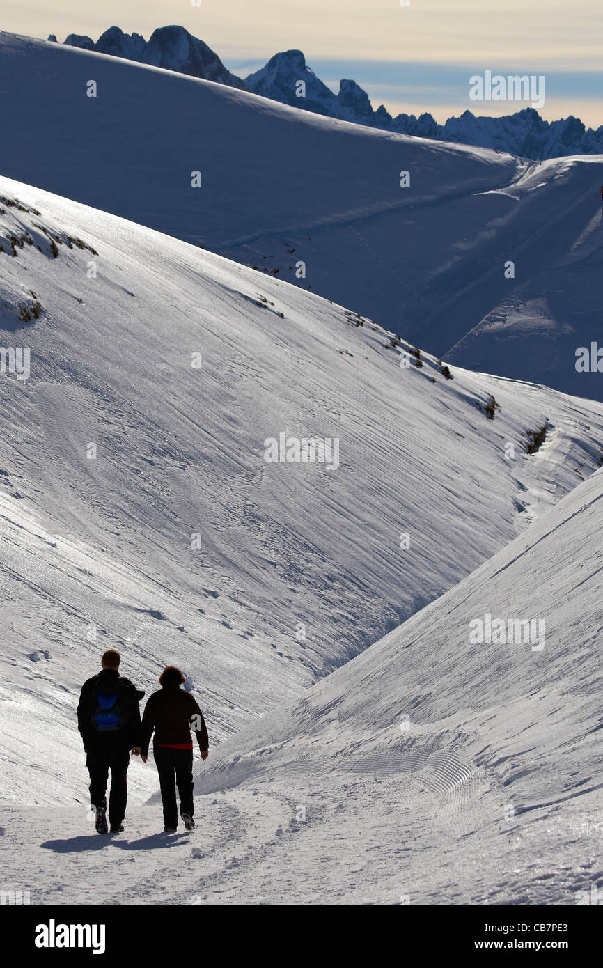 Hiking through the Alps in winter Stock Photo - Alamy