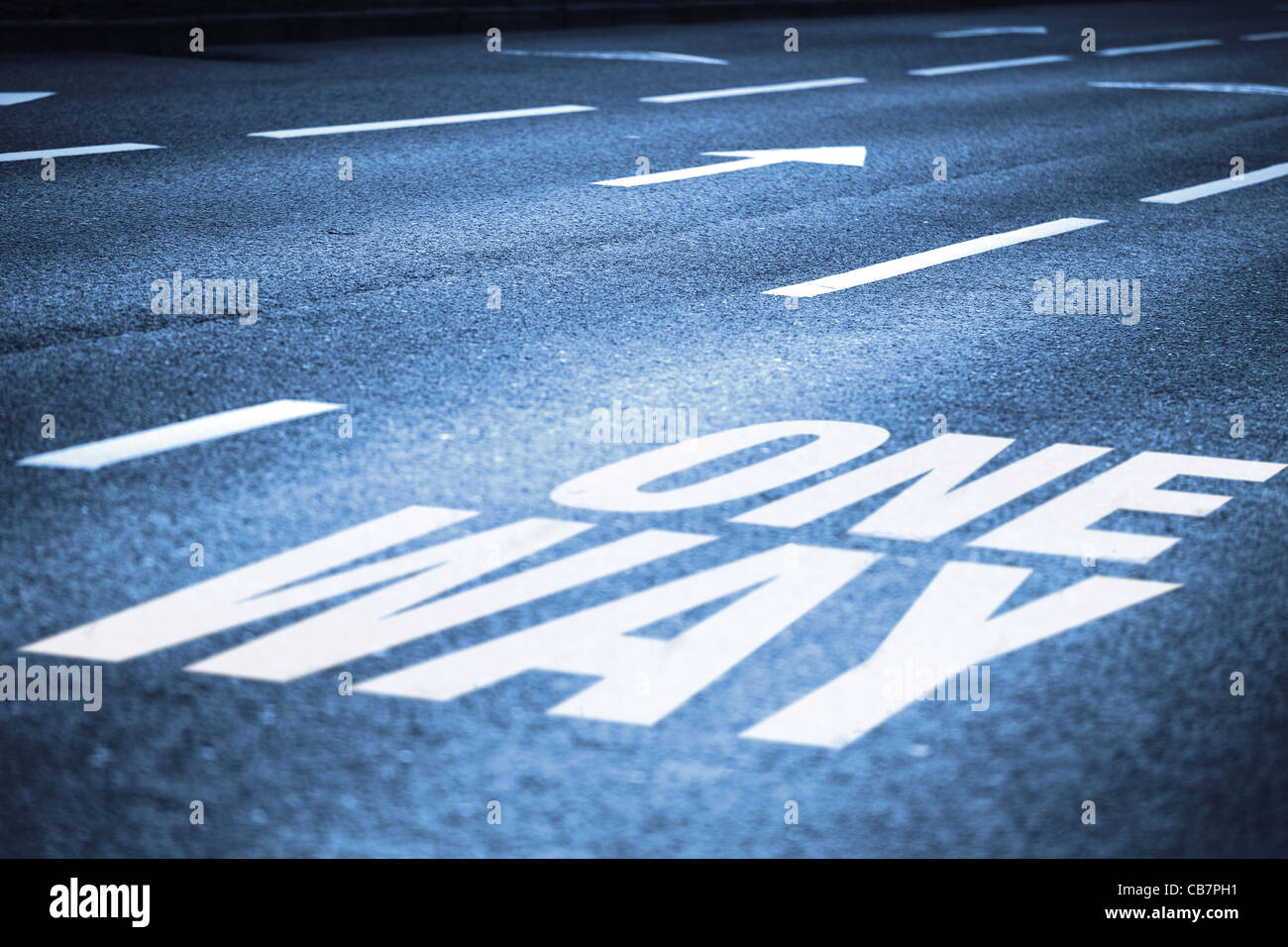 One Way. Blue toned empty road background. Shallow DOF Stock Photo - Alamy