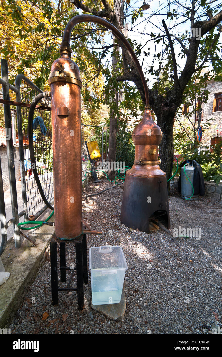 A copper still producing Tsipouro, a traditional Greek, spirit, at the ...