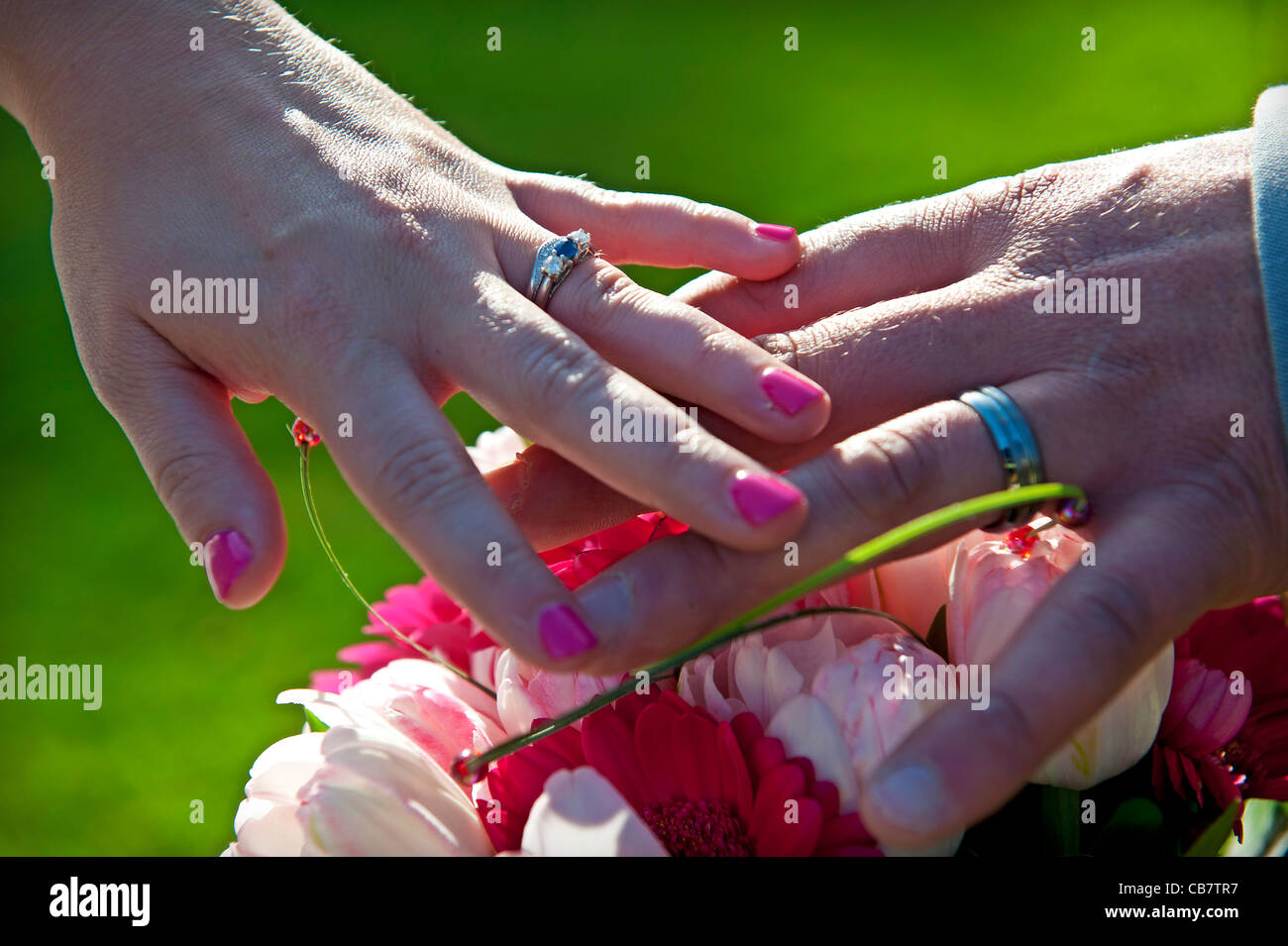bride and groom wedding rings Stock Photo - Alamy