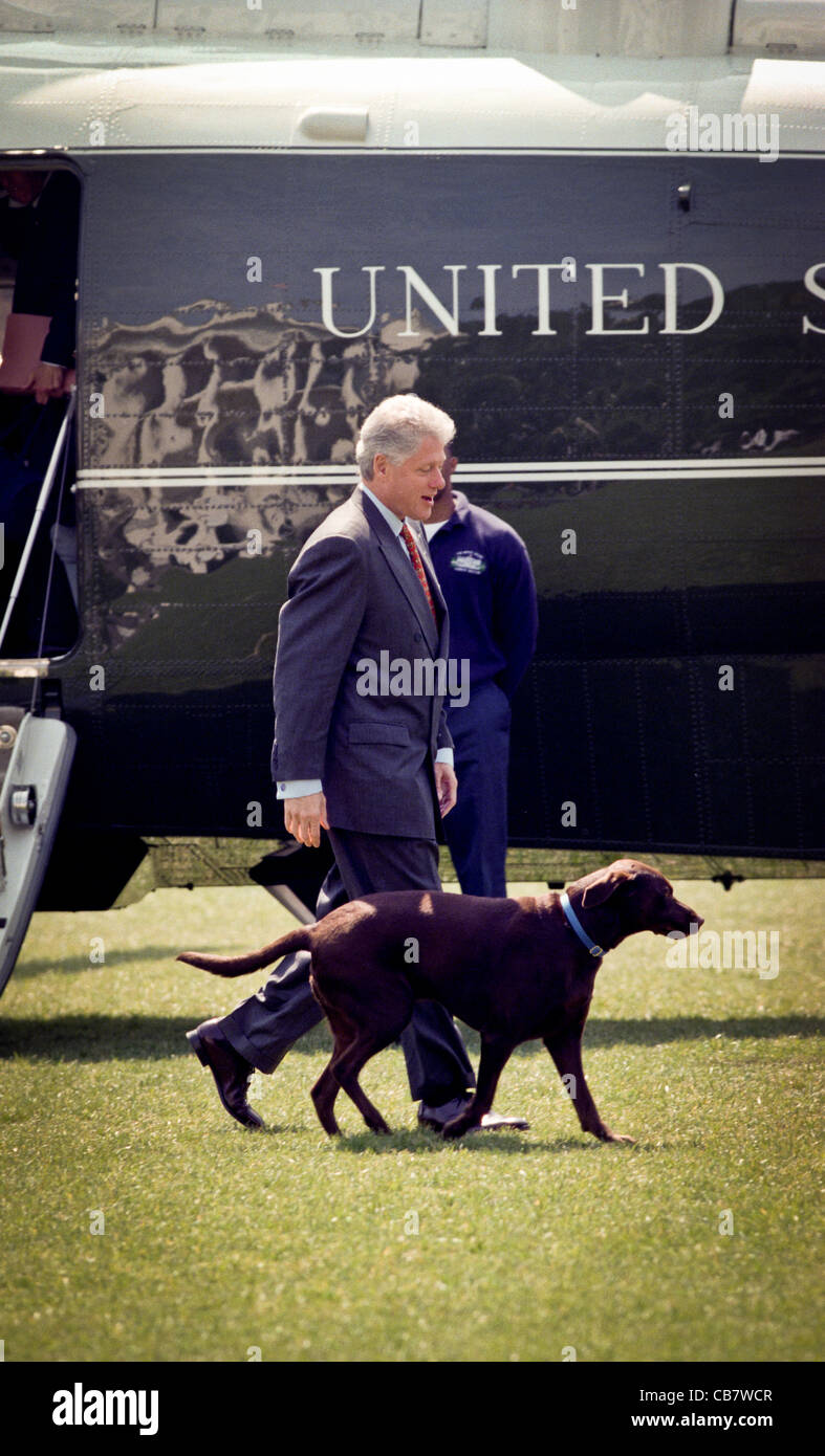 US President Bill Clinton walks with his dog Buddy to the Oval Office ...