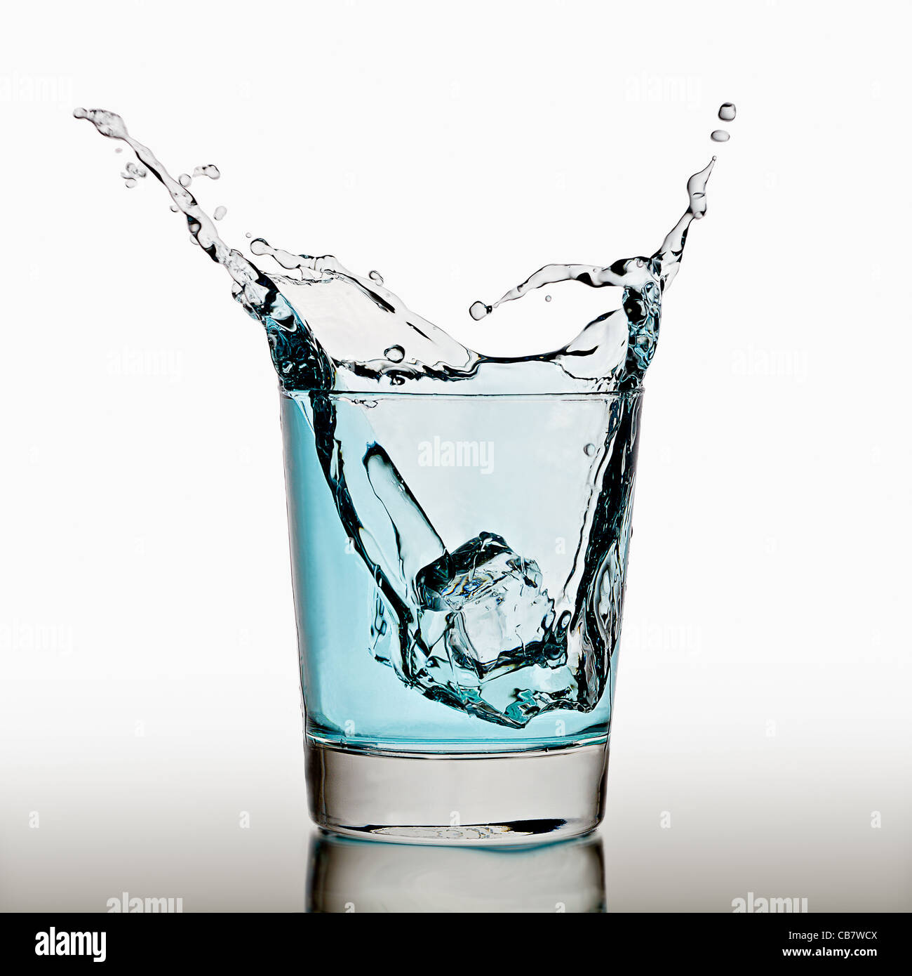 Ice drop with water splash hi-res stock photography and images - Alamy