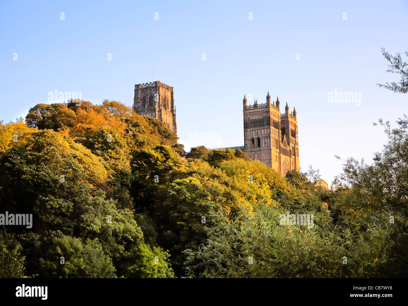 Durham Cathedral on the skyline in soft autumn light with a clear blue ...