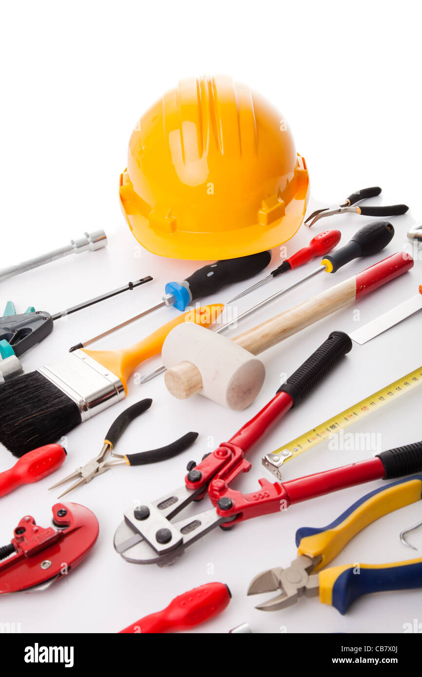 a mix of construction tools over a white background Stock Photo - Alamy