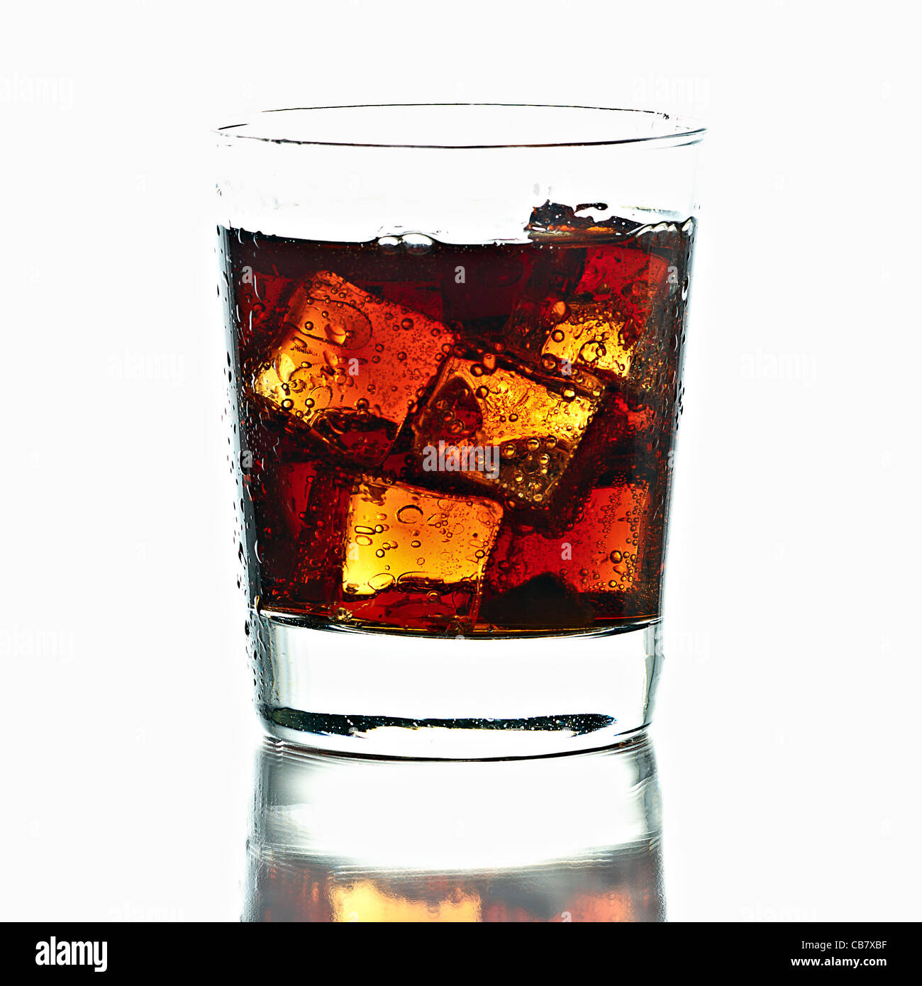 Fresh Cold Cola with ice in glass isolated on white background Stock ...