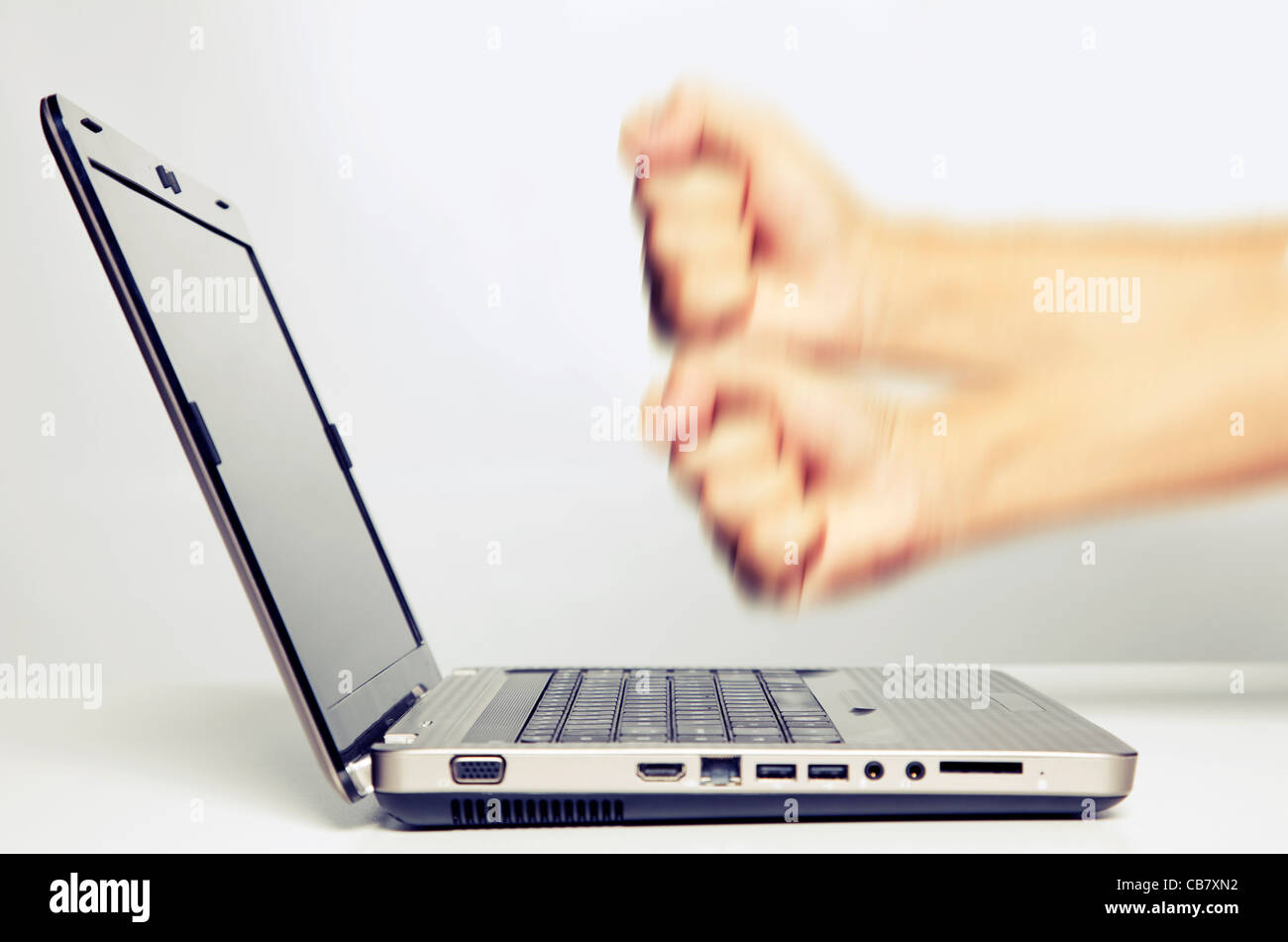 hand gesture next to a laptop with cross processing effect (selective ...