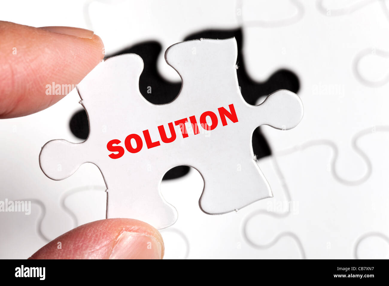 Puzzle and solution hi-res stock photography and images - Alamy