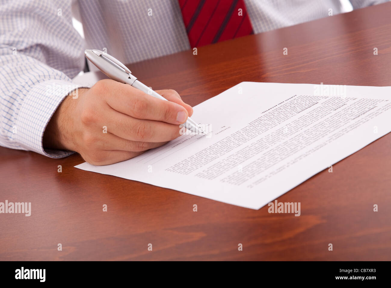 businessman at the office signing a contract Stock Photo - Alamy