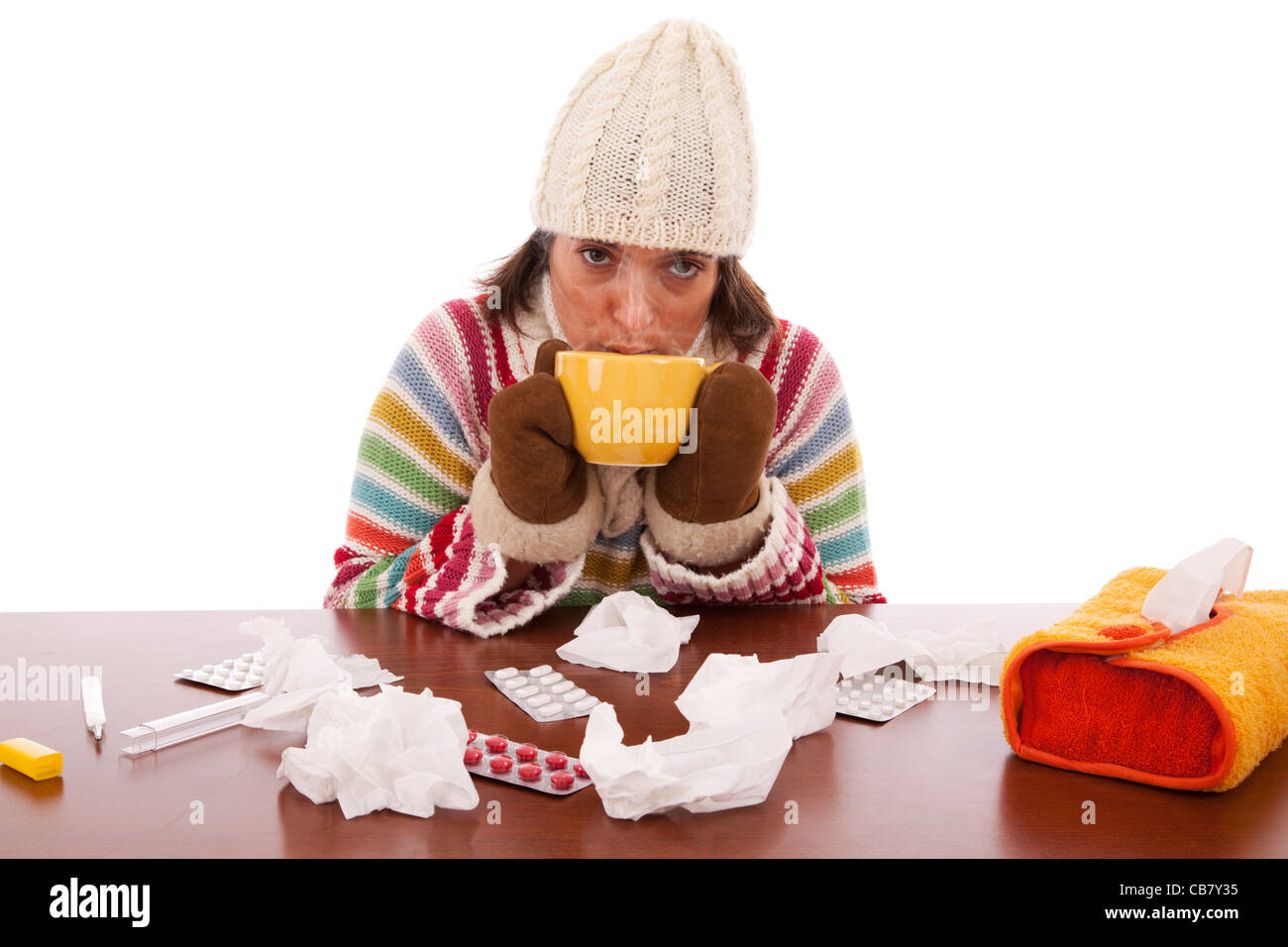 sad woman with flu symptom holding a mug with a hot drink (isolated on ...