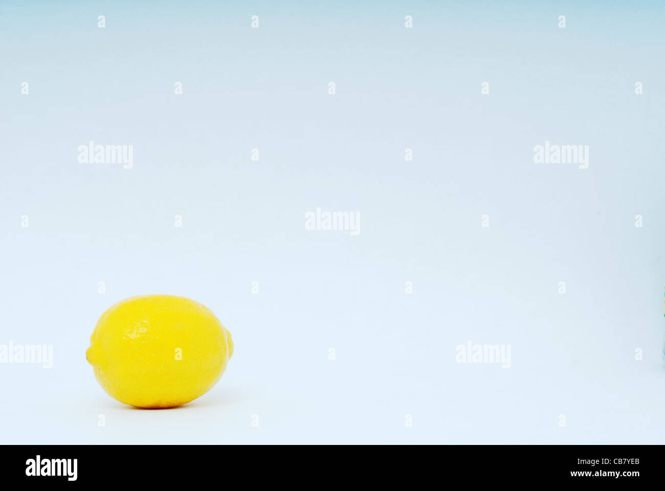 whole lemon left side image. room for text Stock Photo - Alamy