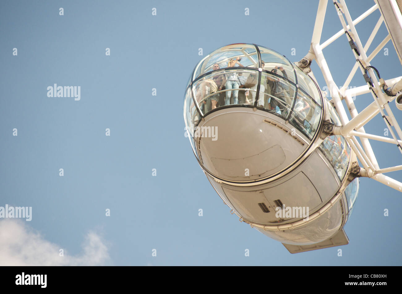 London Eye capsule with tourists Stock Photo - Alamy