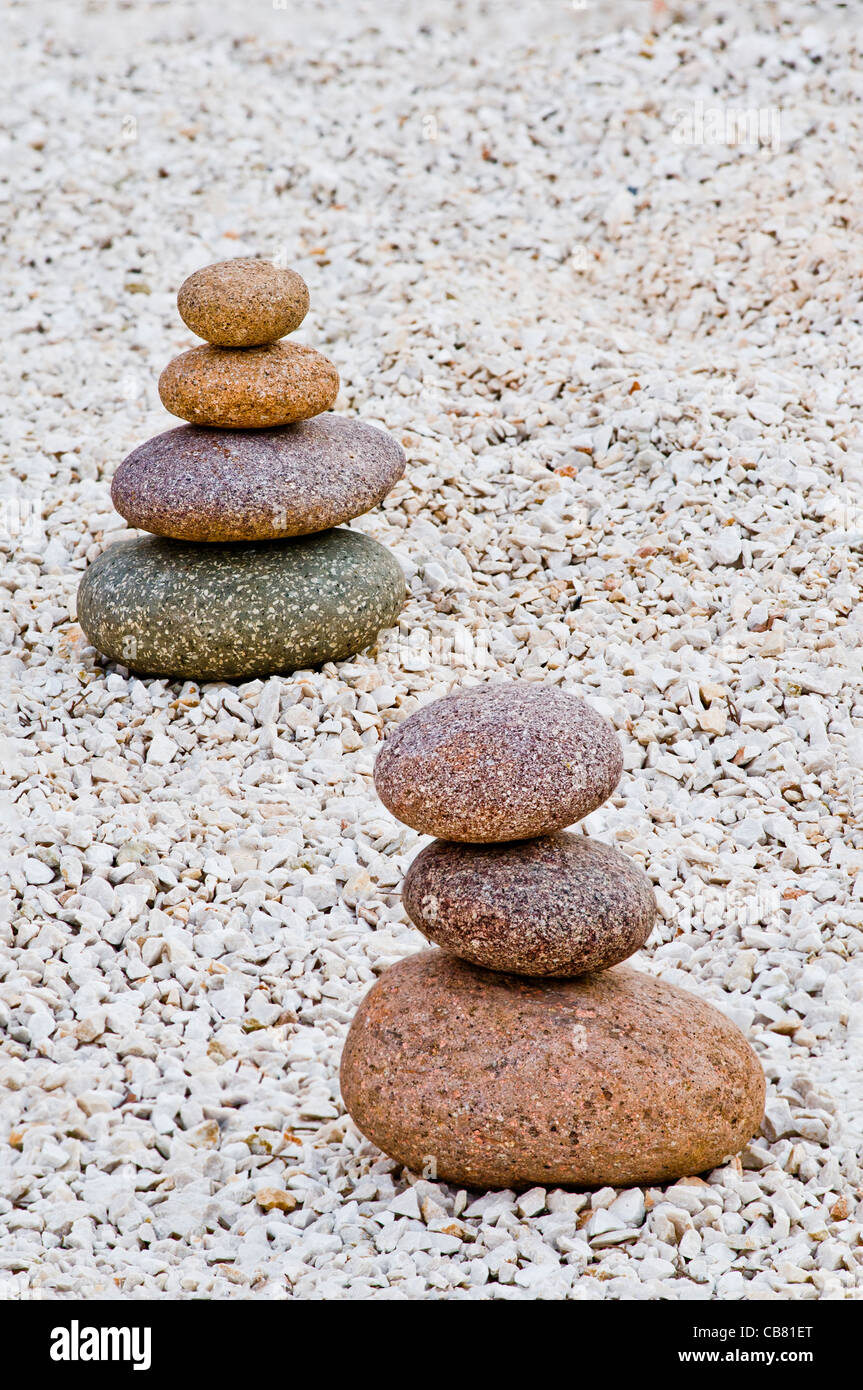 group of Stack of balanced stones on gravel Stock Photo - Alamy