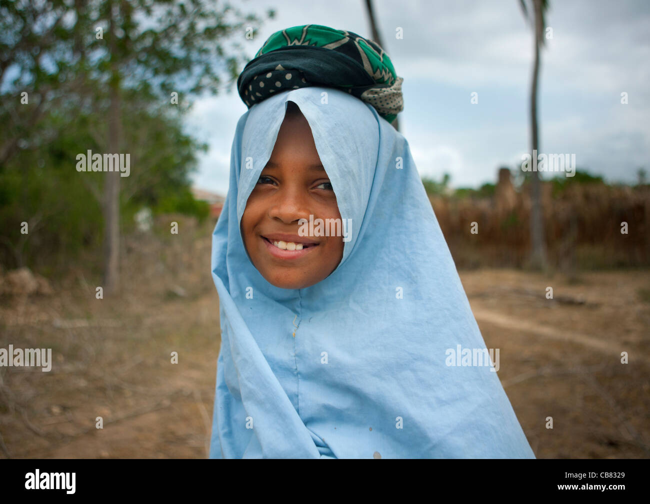 Teenage Girl Wearing Hijab And Holding Cushion On Pate Island, Lamu ...