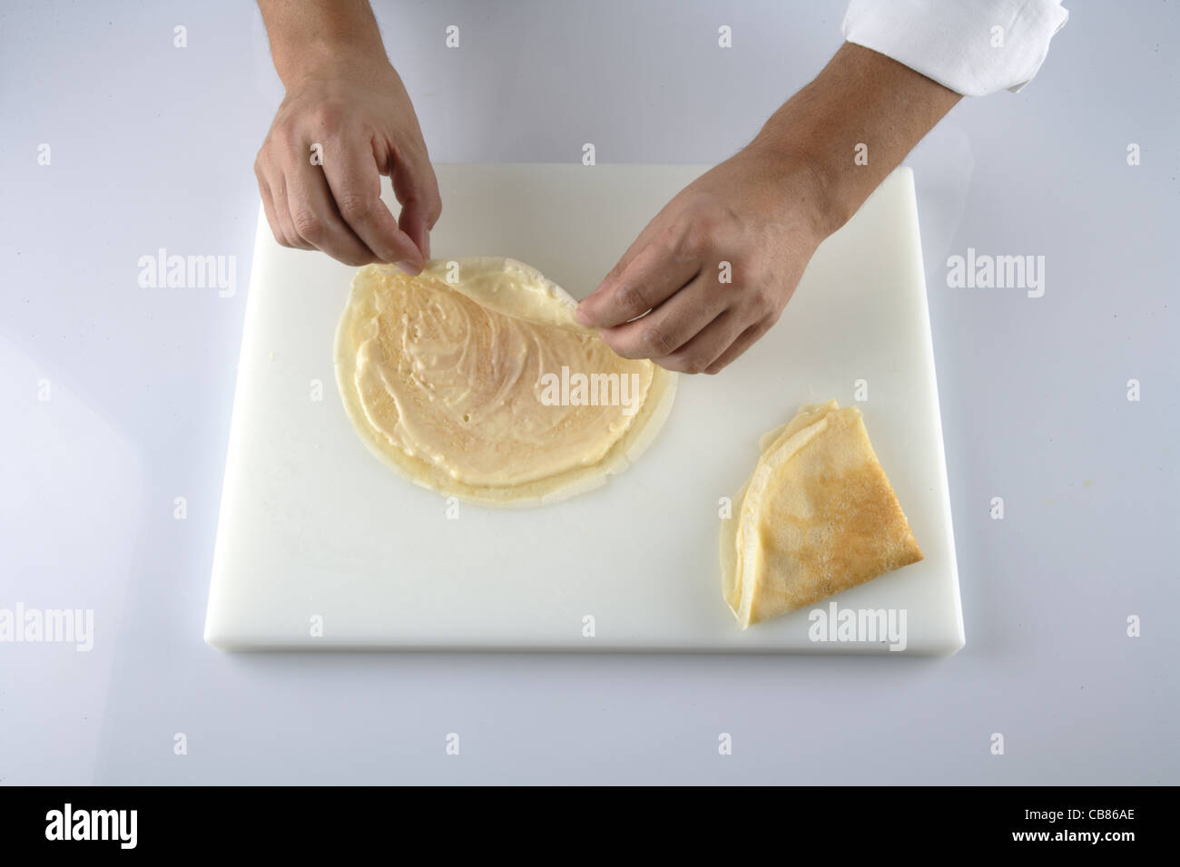 Bending crepes in four Stock Photo - Alamy