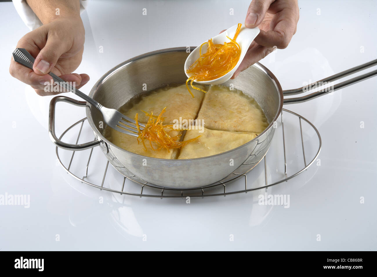 Adding orange peel Stock Photo - Alamy
