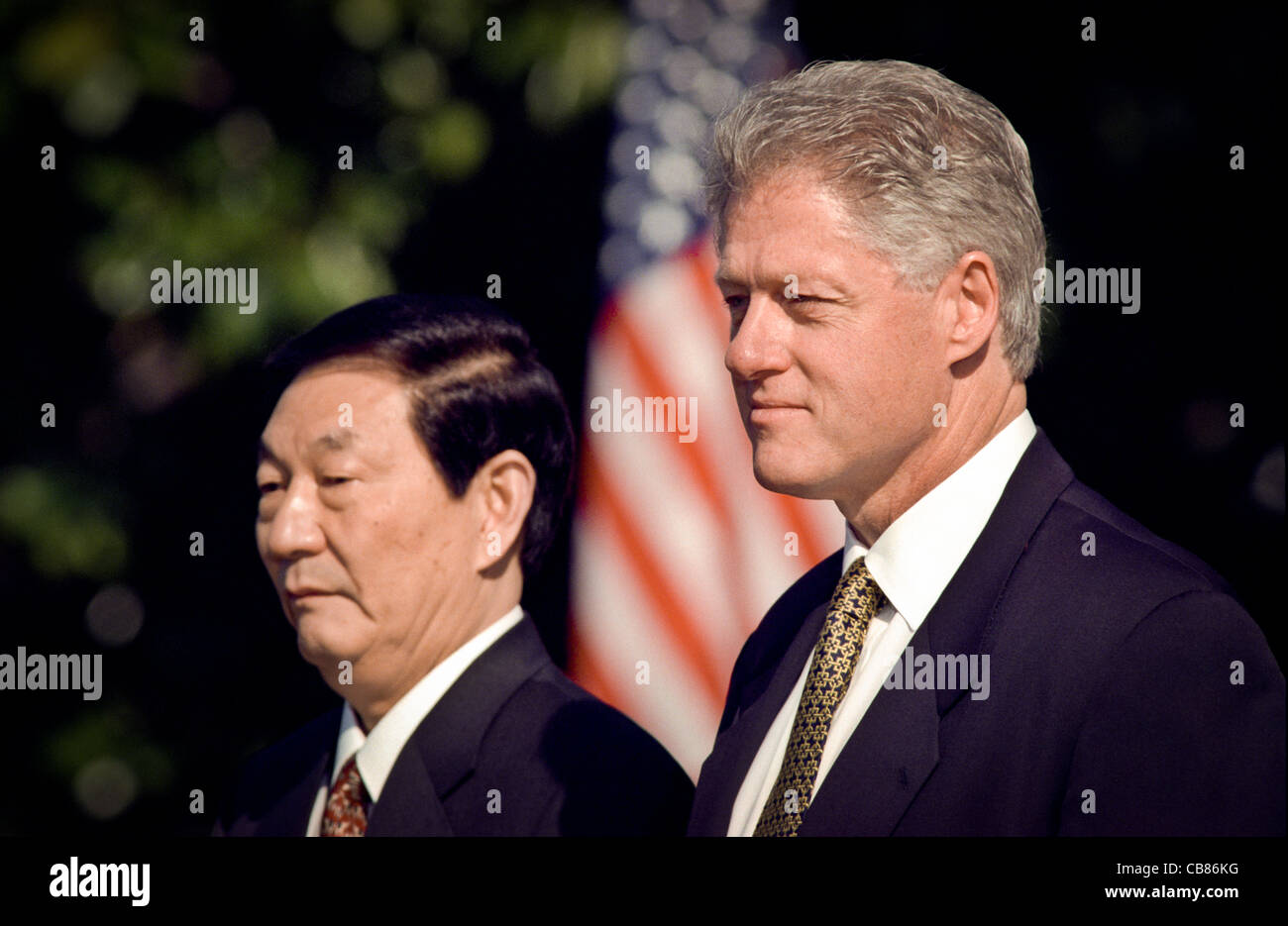 US President Bill Clinton stands with Chinese Premier Zhu Rongji during ...