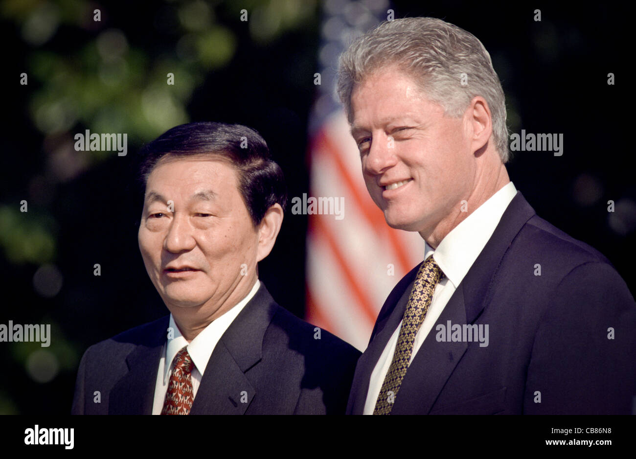 US President Bill Clinton stands with Chinese Premier Zhu Rongji during ...