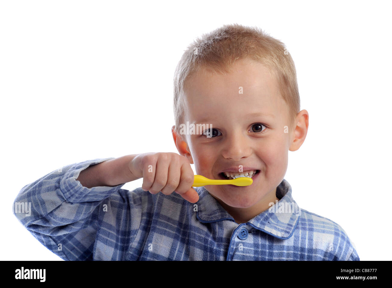 little boy cleaning his teeth. On white background Stock Photo - Alamy