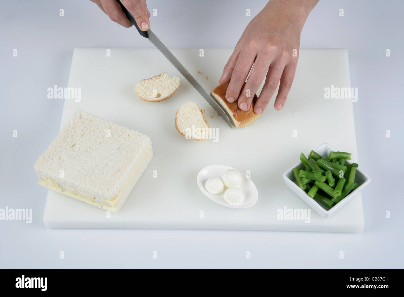 Cutting bread, step by step Stock Photo - Alamy
