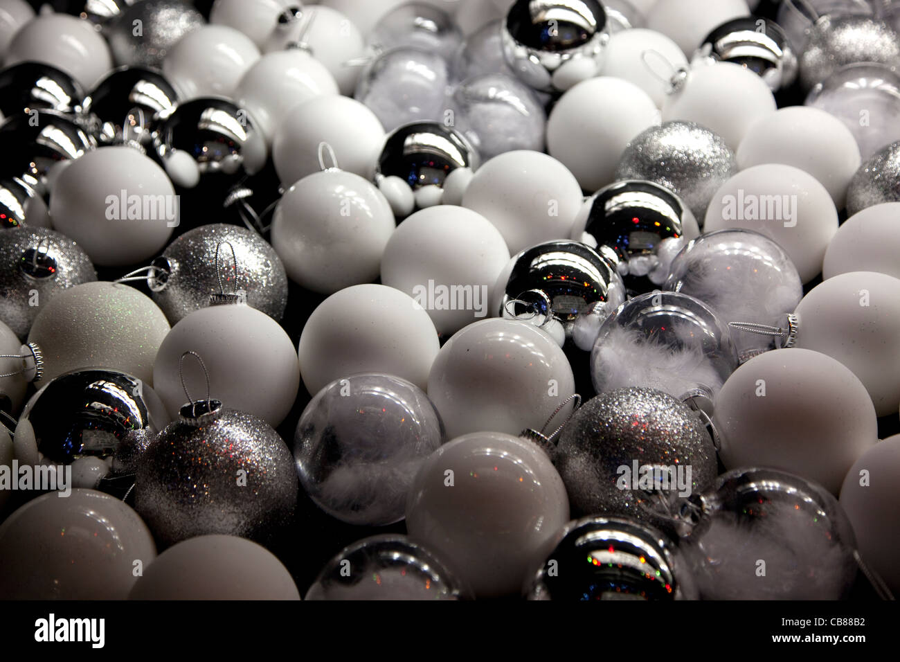 Christmas tree baubles in shop window display, London Stock Photo - Alamy