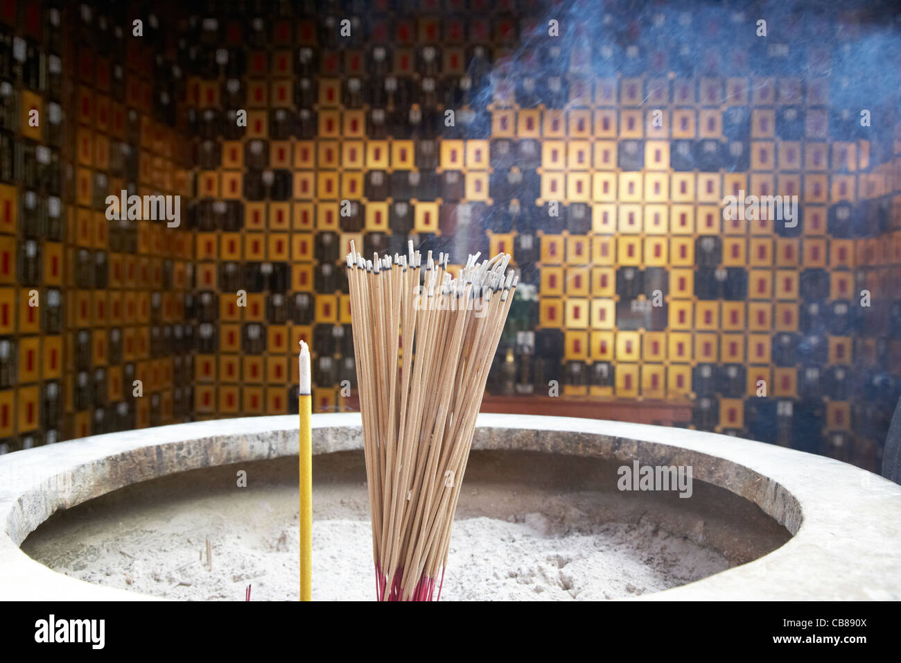 burning incense in a columbarium of po fook hill cemetery sha tin, hong ...