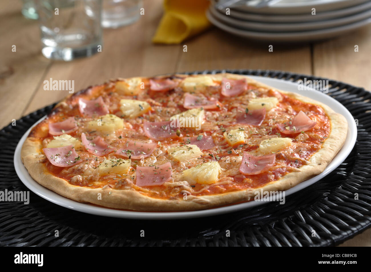 Tropical pizza (pineapple, ham, tomato, cheese Stock Photo - Alamy