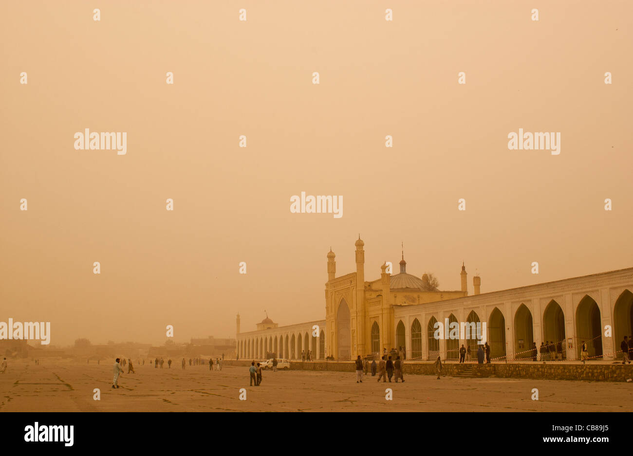 People arrive at the Id Gah (Eid Gah) mosque, used as a polling station ...
