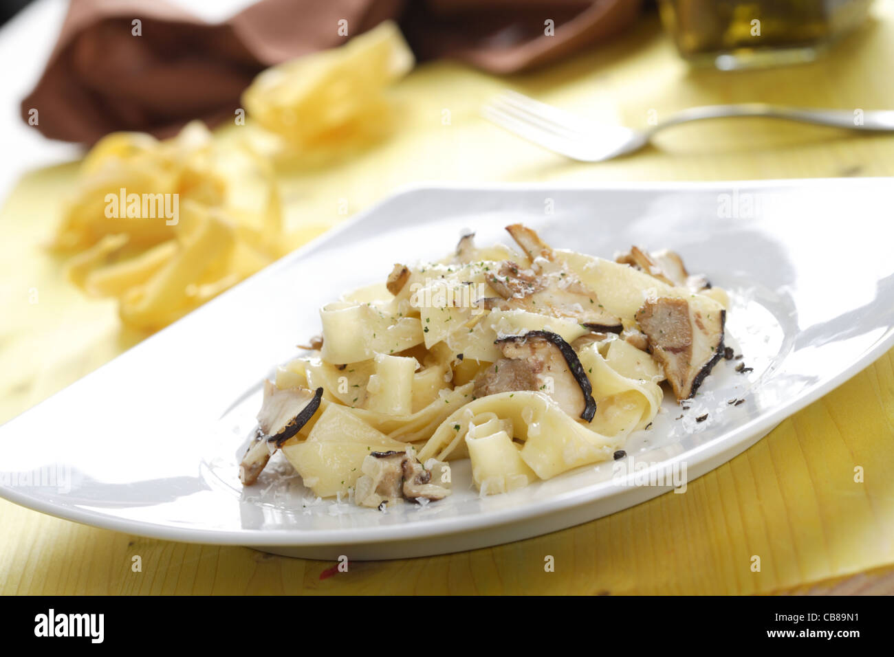 Pasta ribbons with mushrooms and parmesan Stock Photo - Alamy