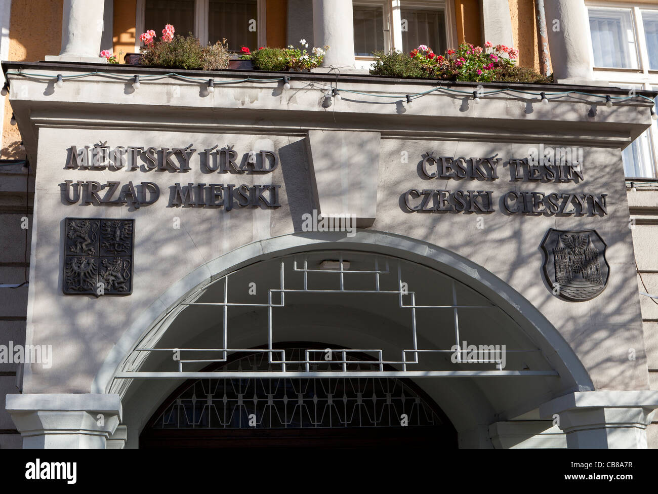 Signs in Czech and Polish languages on the town hall building in Cesky ...