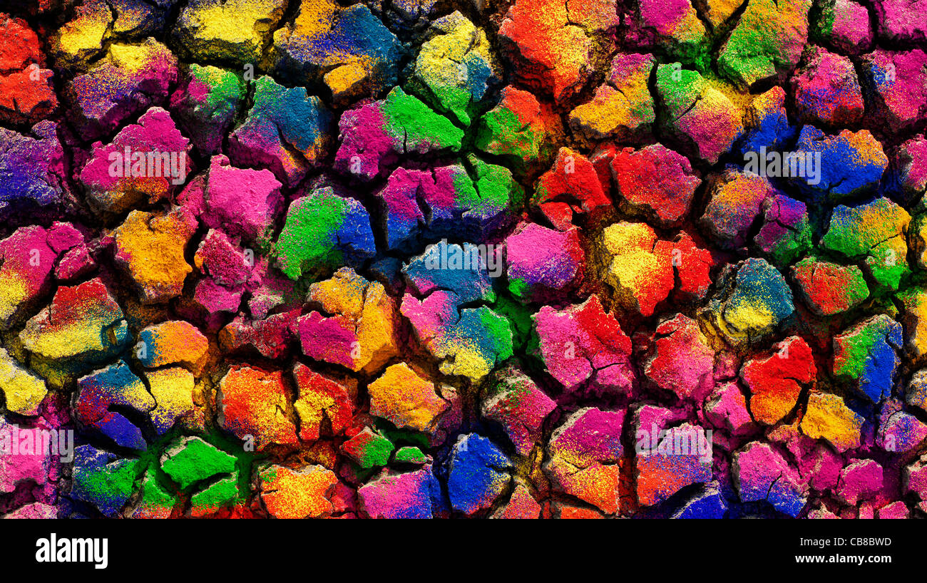 Dried cracked earth covered in colourful powder pattern. India Stock ...