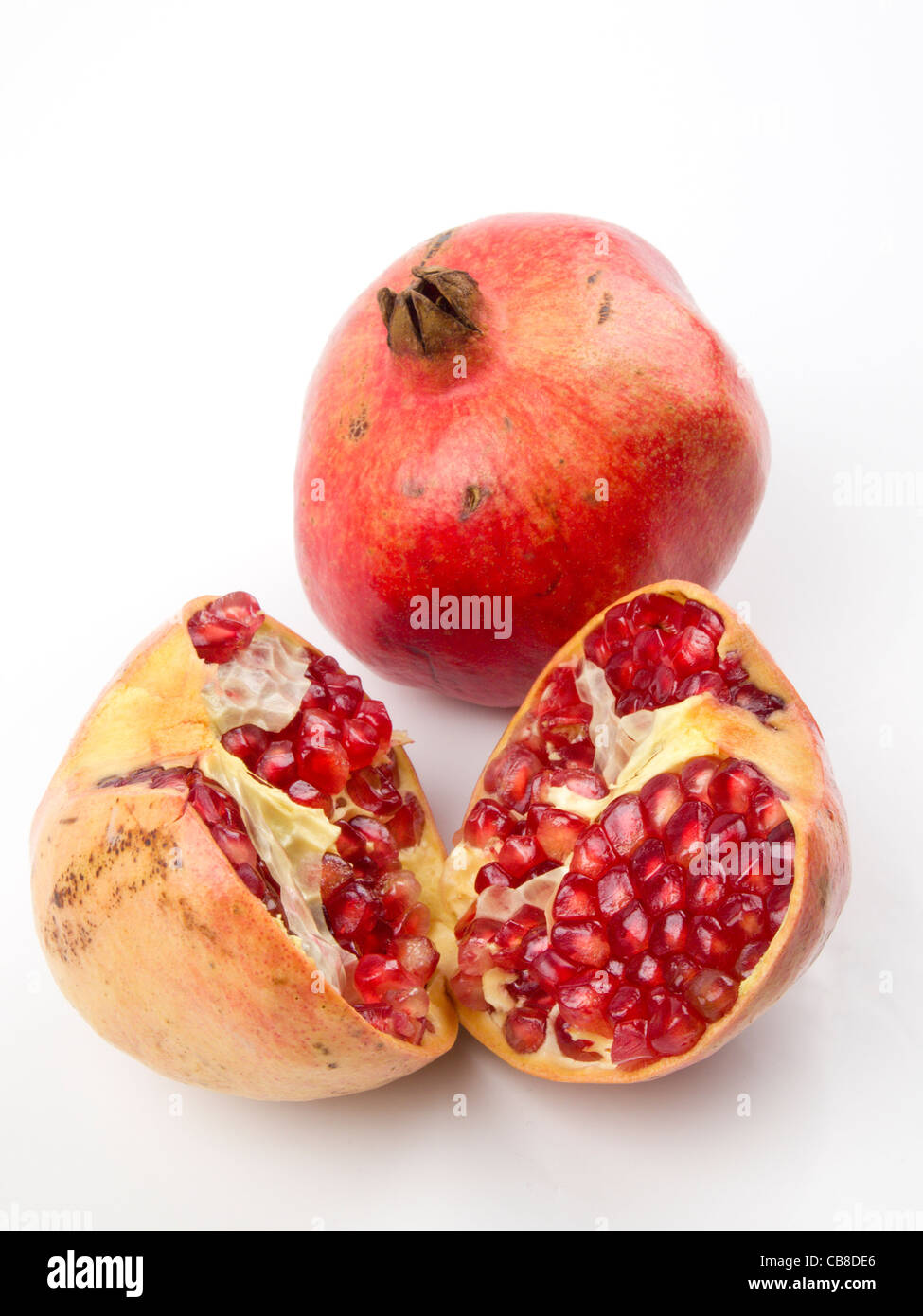 Pomegranate close up isolated on white background Stock Photo - Alamy