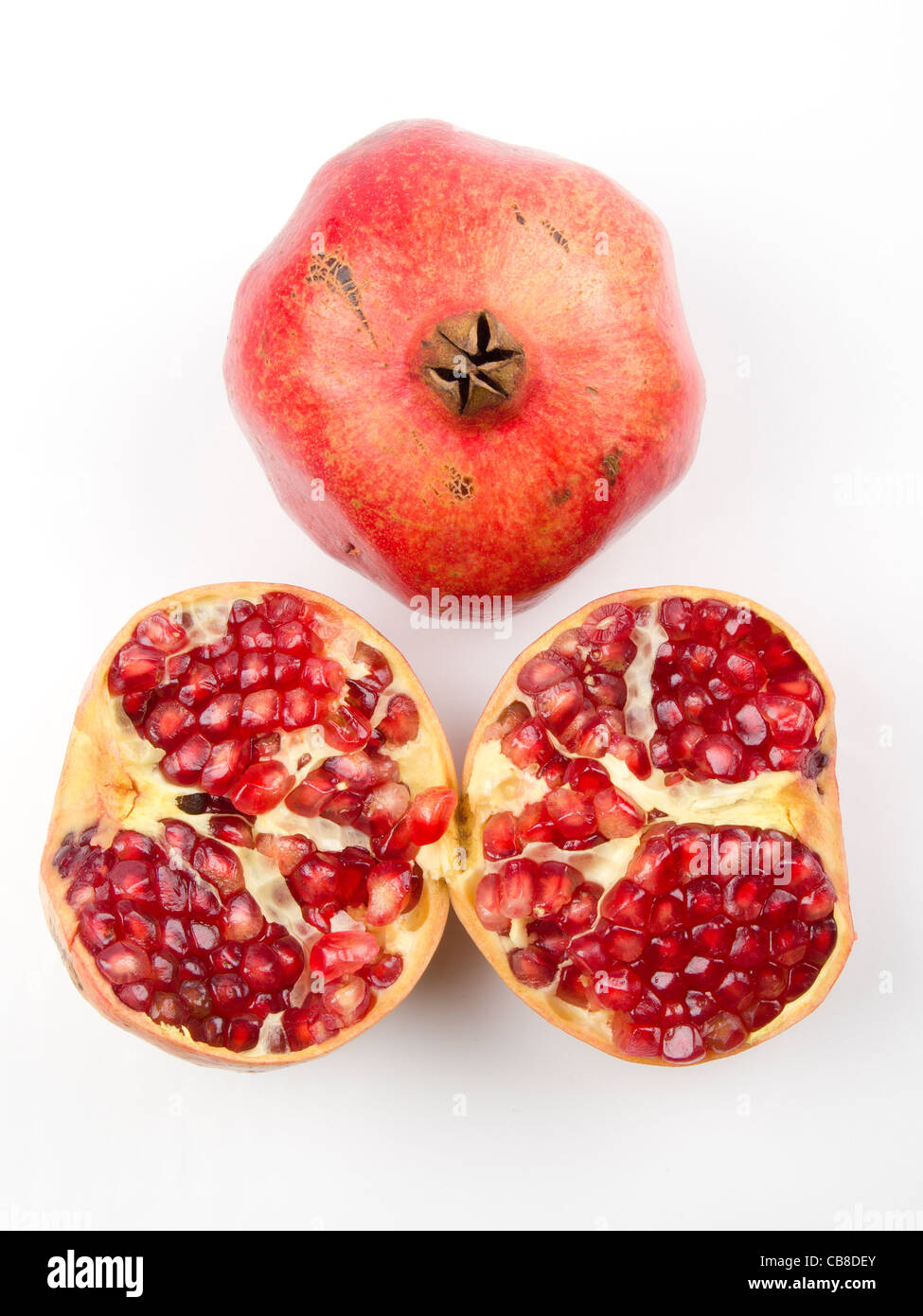 Pomegranate close up isolated on white background Stock Photo - Alamy