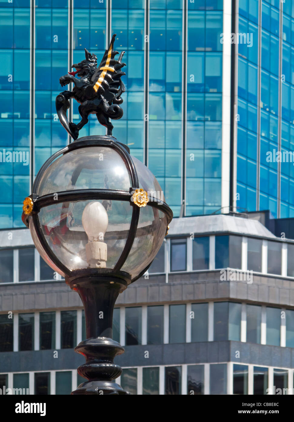 Traditional spherical glass street lamps in the City of London England ...