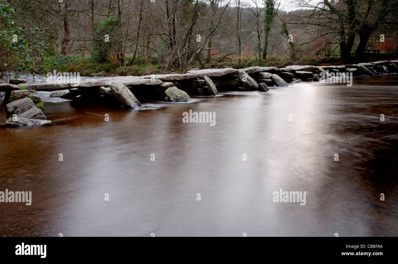 ancient monument of Tarr Steps, a prehistoric clapper bridge across the ...