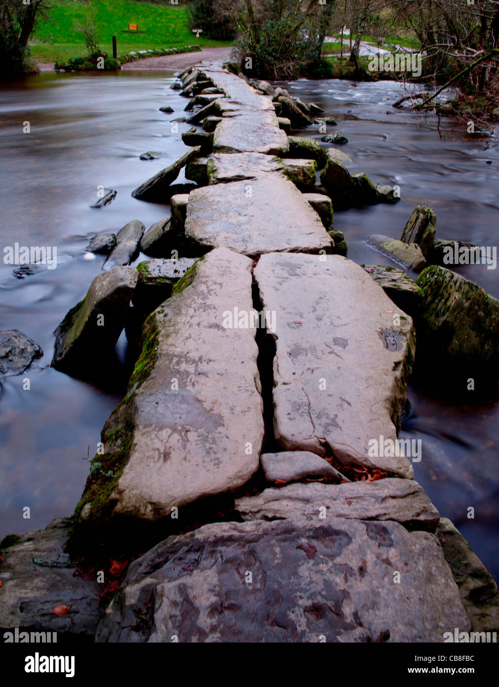 ancient monument of Tarr Steps, a prehistoric clapper bridge across the ...