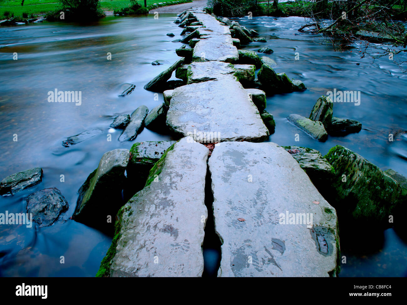 ancient monument of Tarr Steps, a prehistoric clapper bridge across the ...