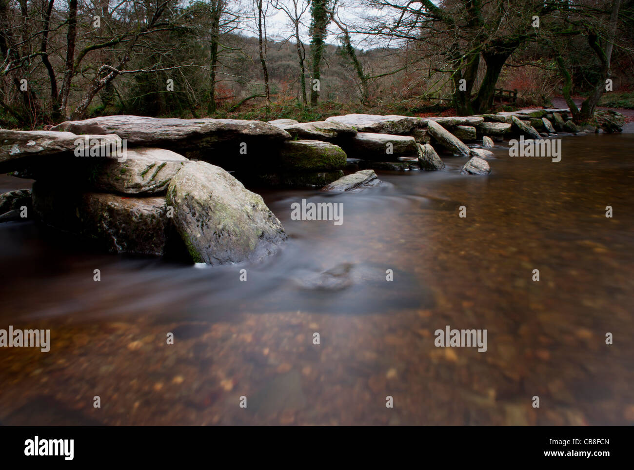ancient monument of Tarr Steps, a prehistoric clapper bridge across the ...