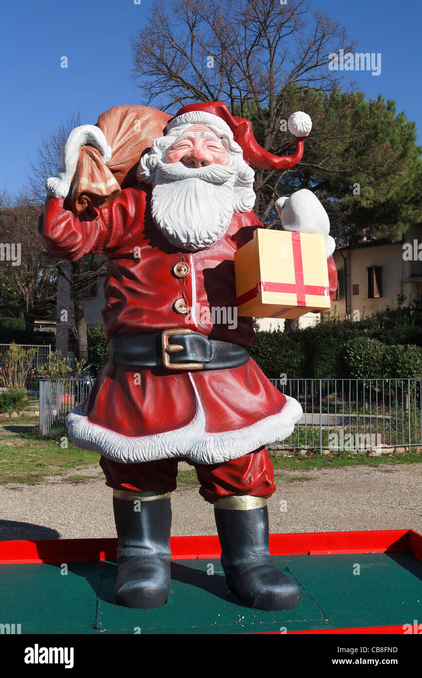 Santa Claus brings gifts Stock Photo - Alamy